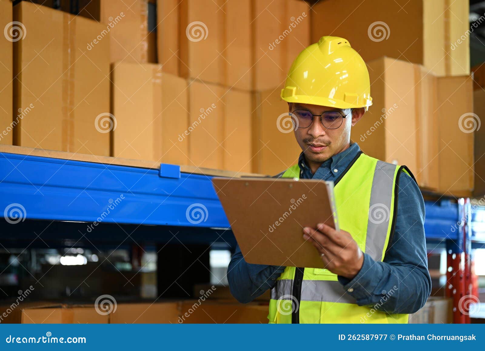 Focused Male Manager Checking Quantity of Storage Product while ...