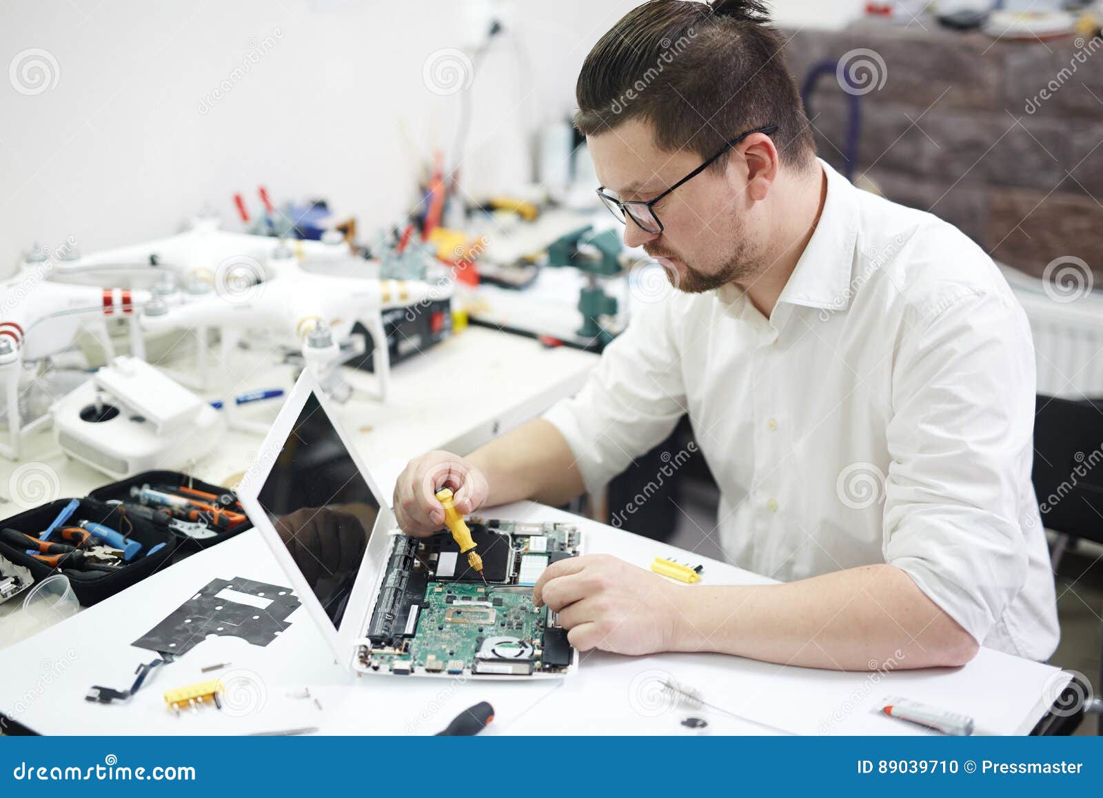 Focused Man Disassembling Electronics Stock Photo - Image of laptop ...
