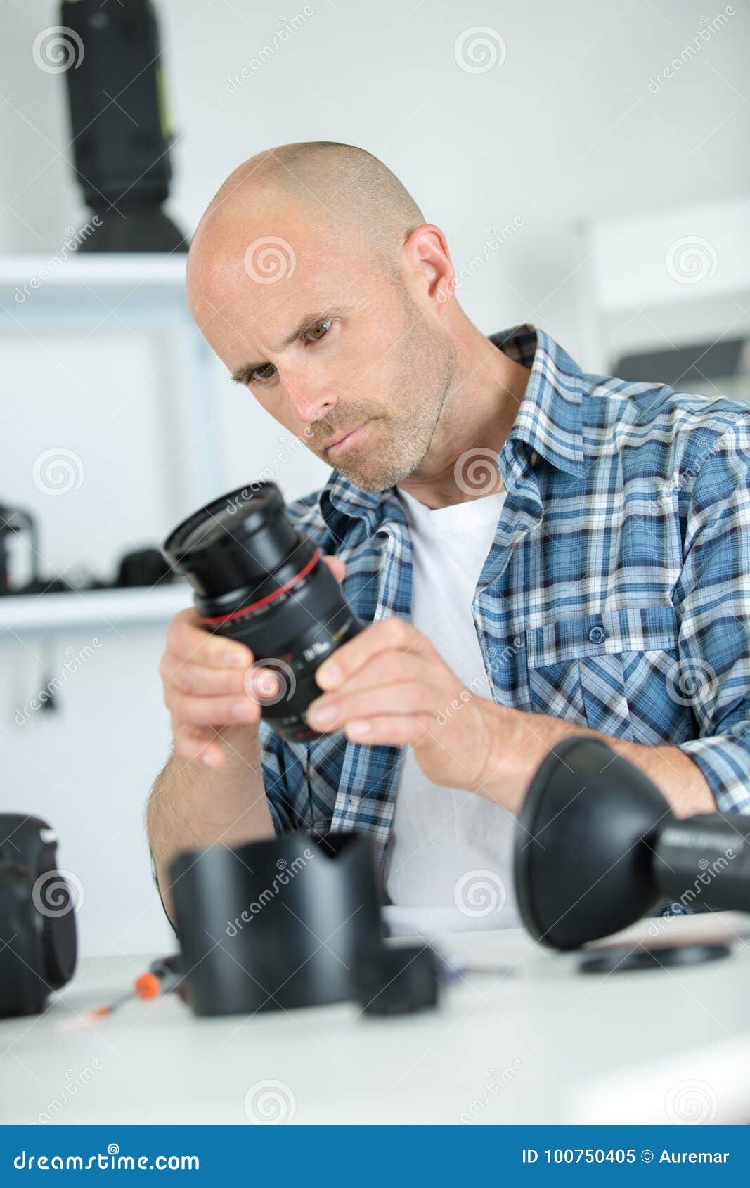 Focused Man Fixing Camera at Workplace Stock Image - Image of ...