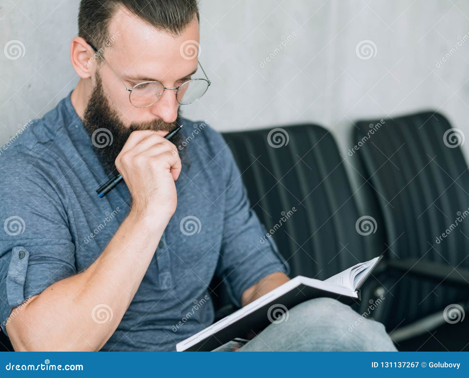 Focused Man Reading Notepad Business Data Analysis Stock Image - Image ...