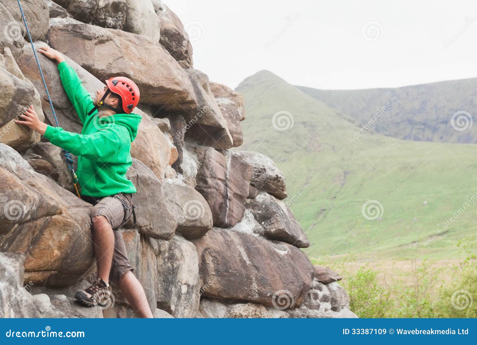 Focused Man Scaling Large Rock Face Stock Photos - Free & Royalty-Free ...