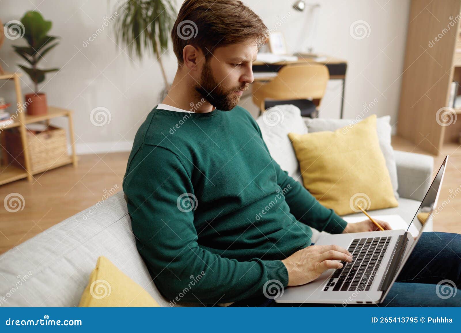 Focused Man Working Laptop. Handsome Young Man Using Laptop Computer ...