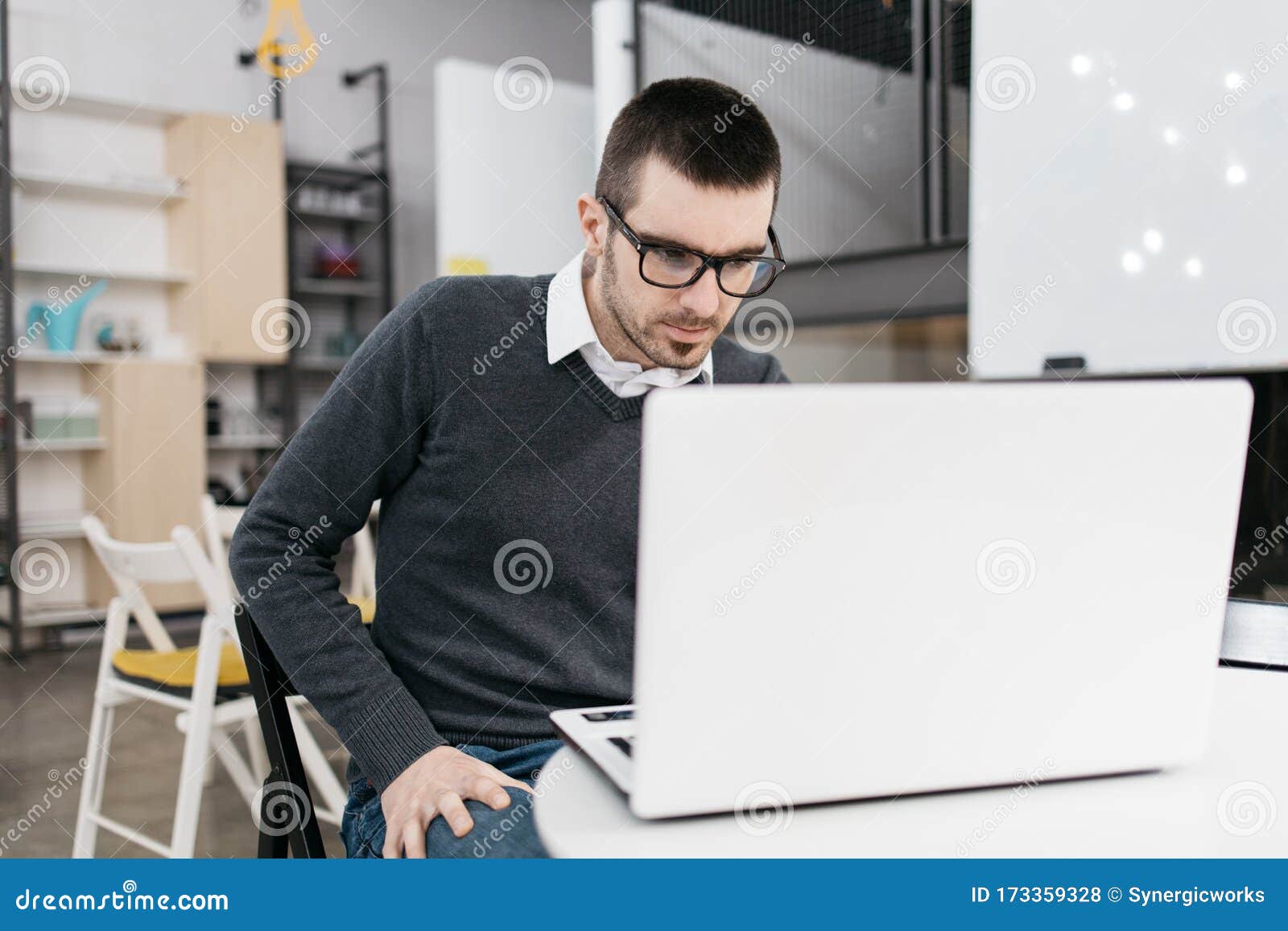 Focused Man Working on Laptop in the Office Stock Photo - Image of ...