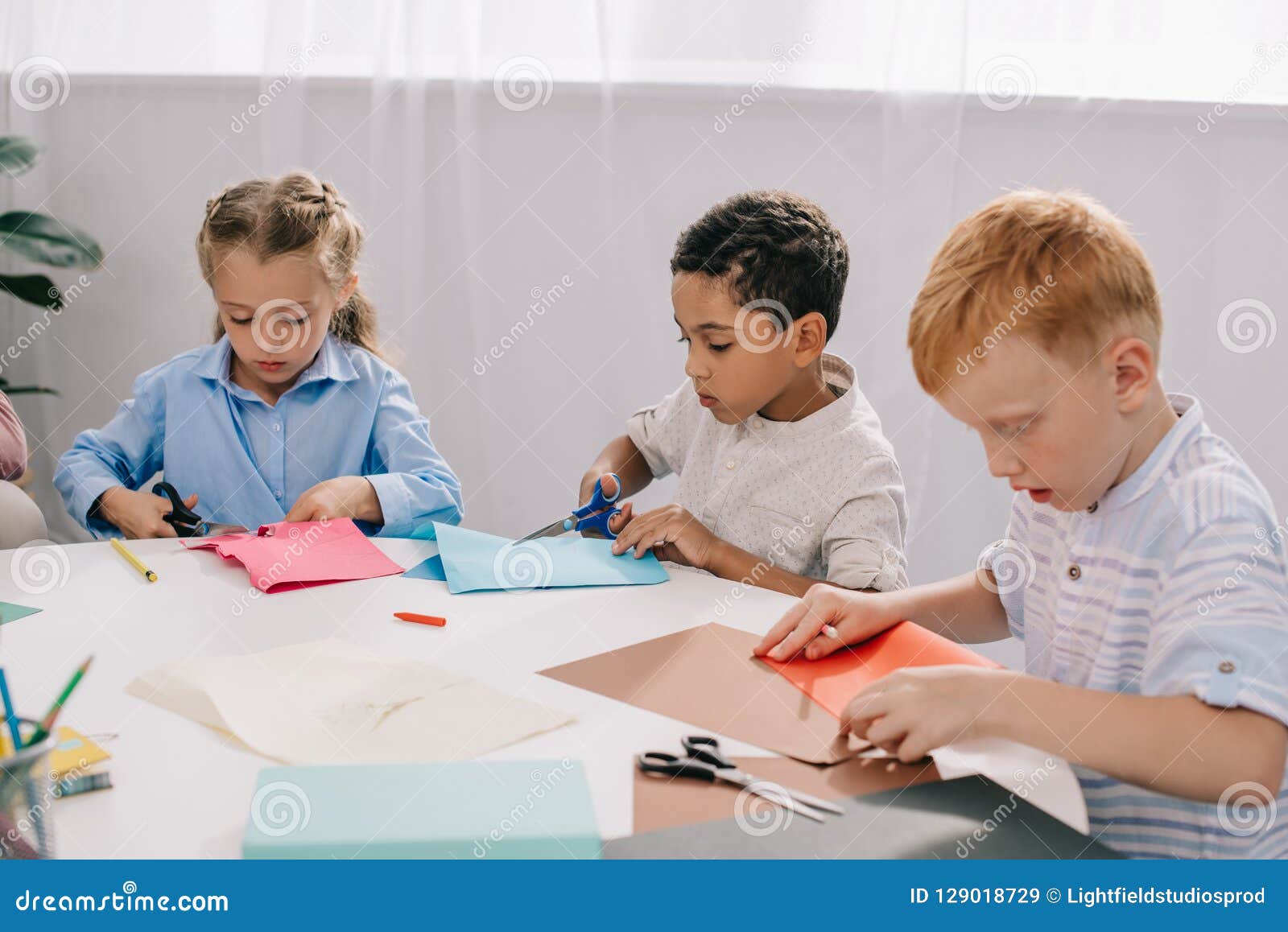 Focused Multicultural Kids Making Paper Applique Stock Image - Image of ...