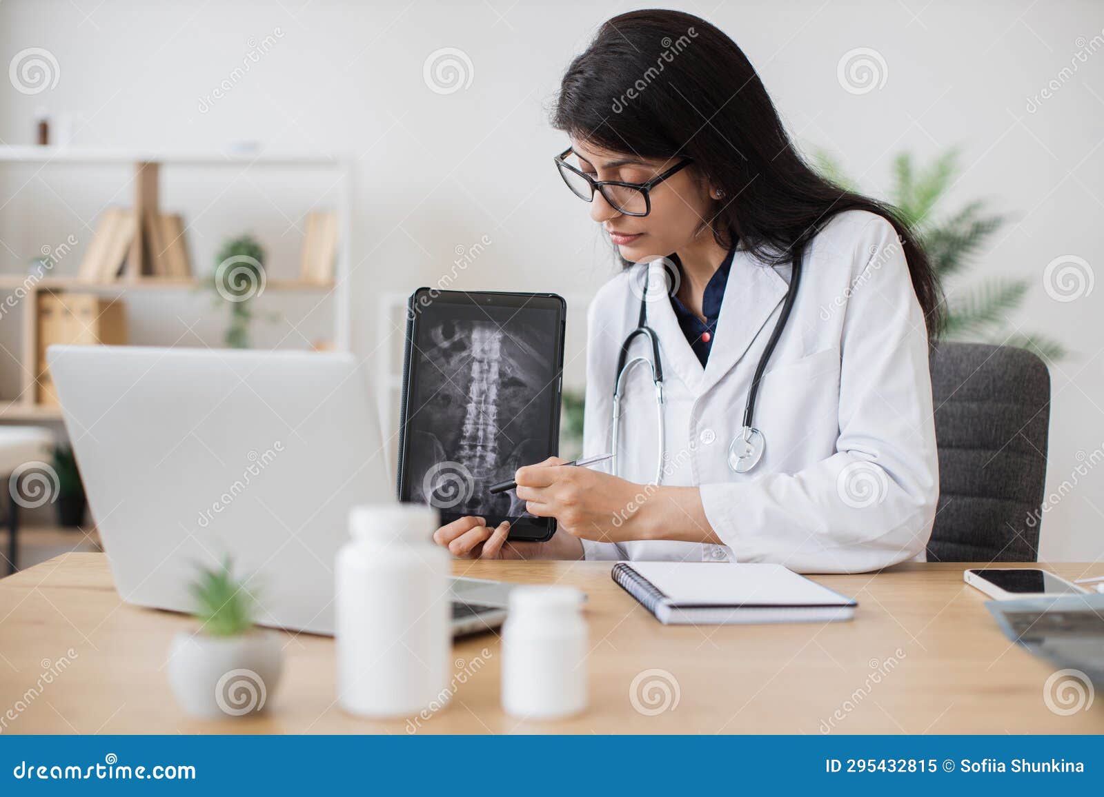 Focused Nurse Talking with Patient with Help of Devices Stock Image ...