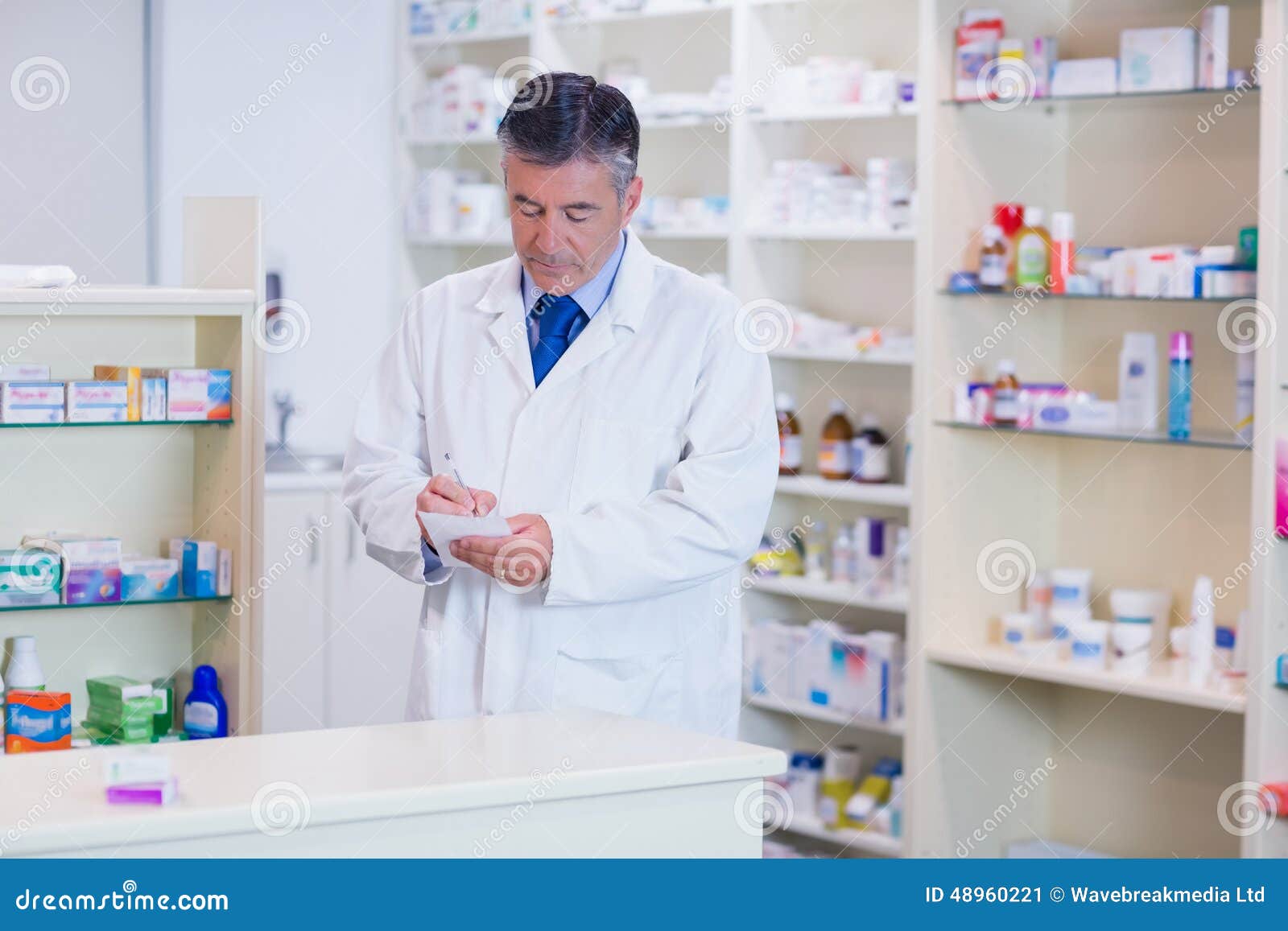 Focused Pharmacist Writing Down Notes Stock Image - Image of woman ...