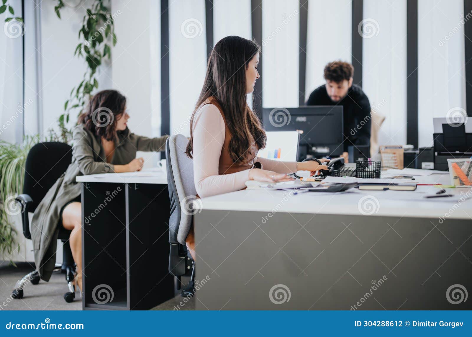 Focused Professionals in Modern Office Setting, Teamwork and ...