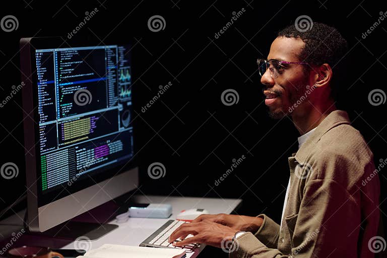 Focused Programmer Analyzing Code on Computer Screen Stock Photo - Image of office, work: 341843372