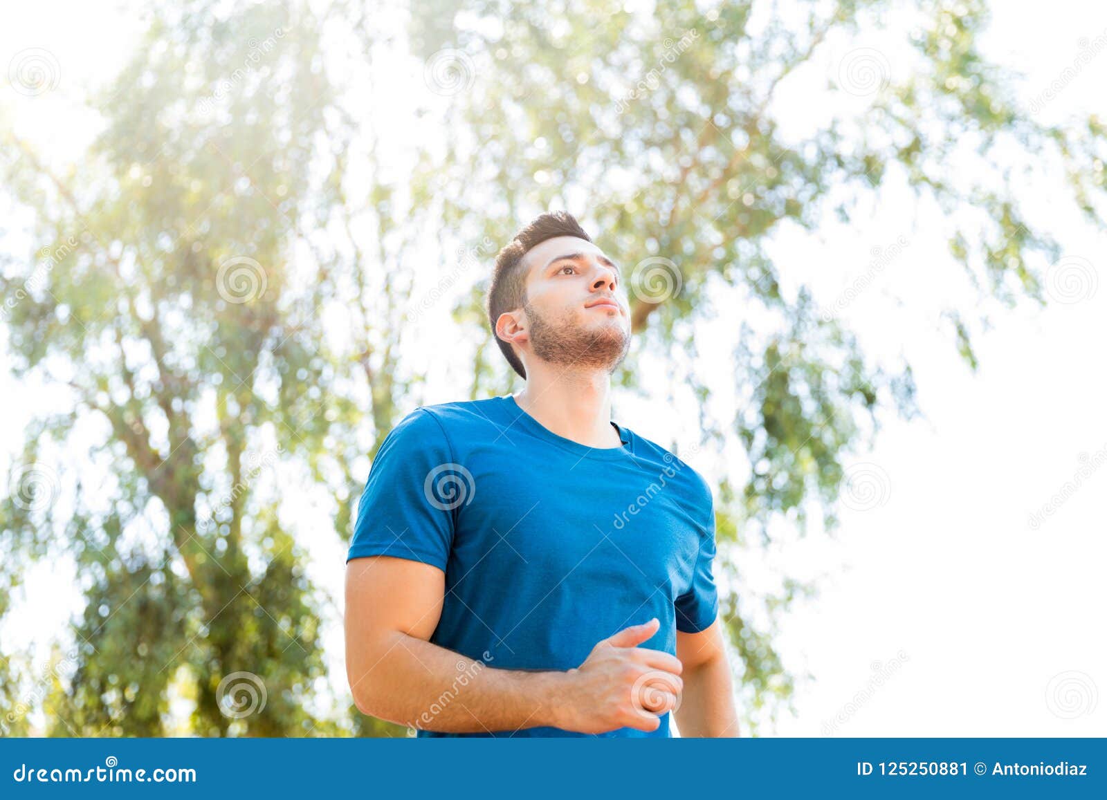 Focused Runner Practicing Running in Park on Sunny Day Stock Image ...
