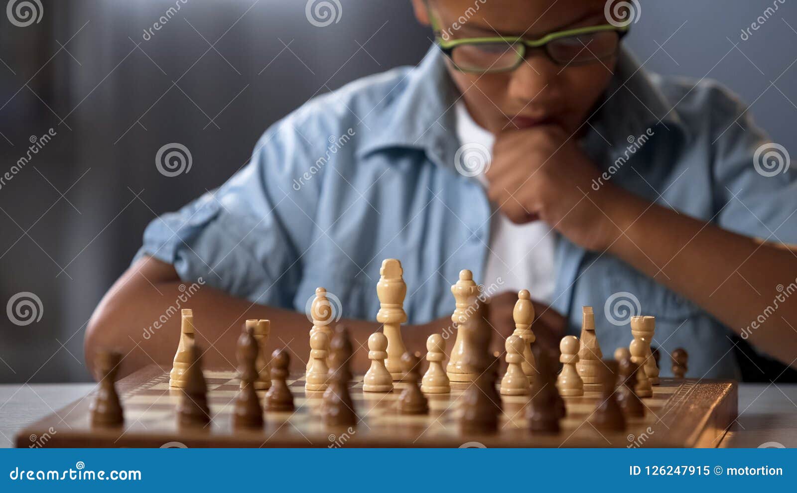 Focused School Boy Thinking of Attacking and Capturing Opponent Chess ...