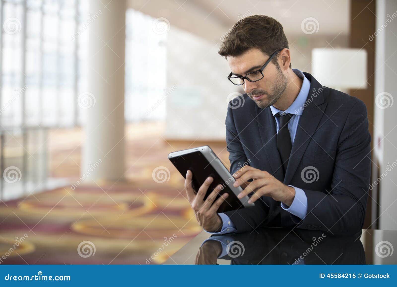 Focused Smart Young Businessman on Tablet Stock Photo - Image of ...