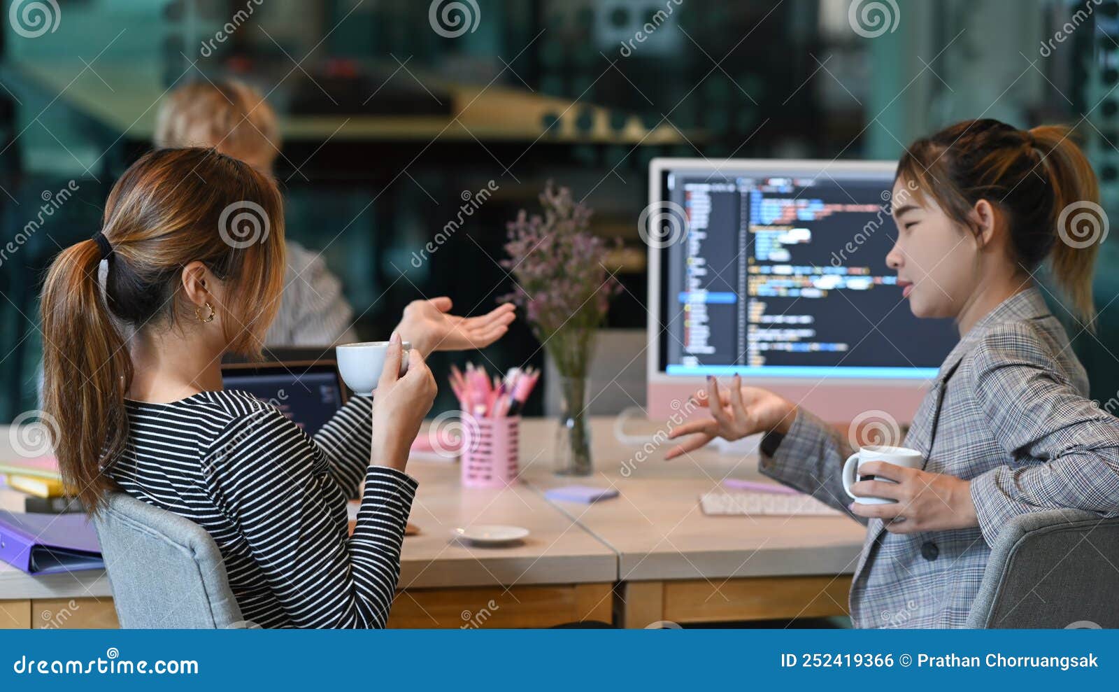 Focused Software Developers Colleagues Discussing and Working on Web ... Focused Software Developers Colleagues Discussing and Working on Web ...