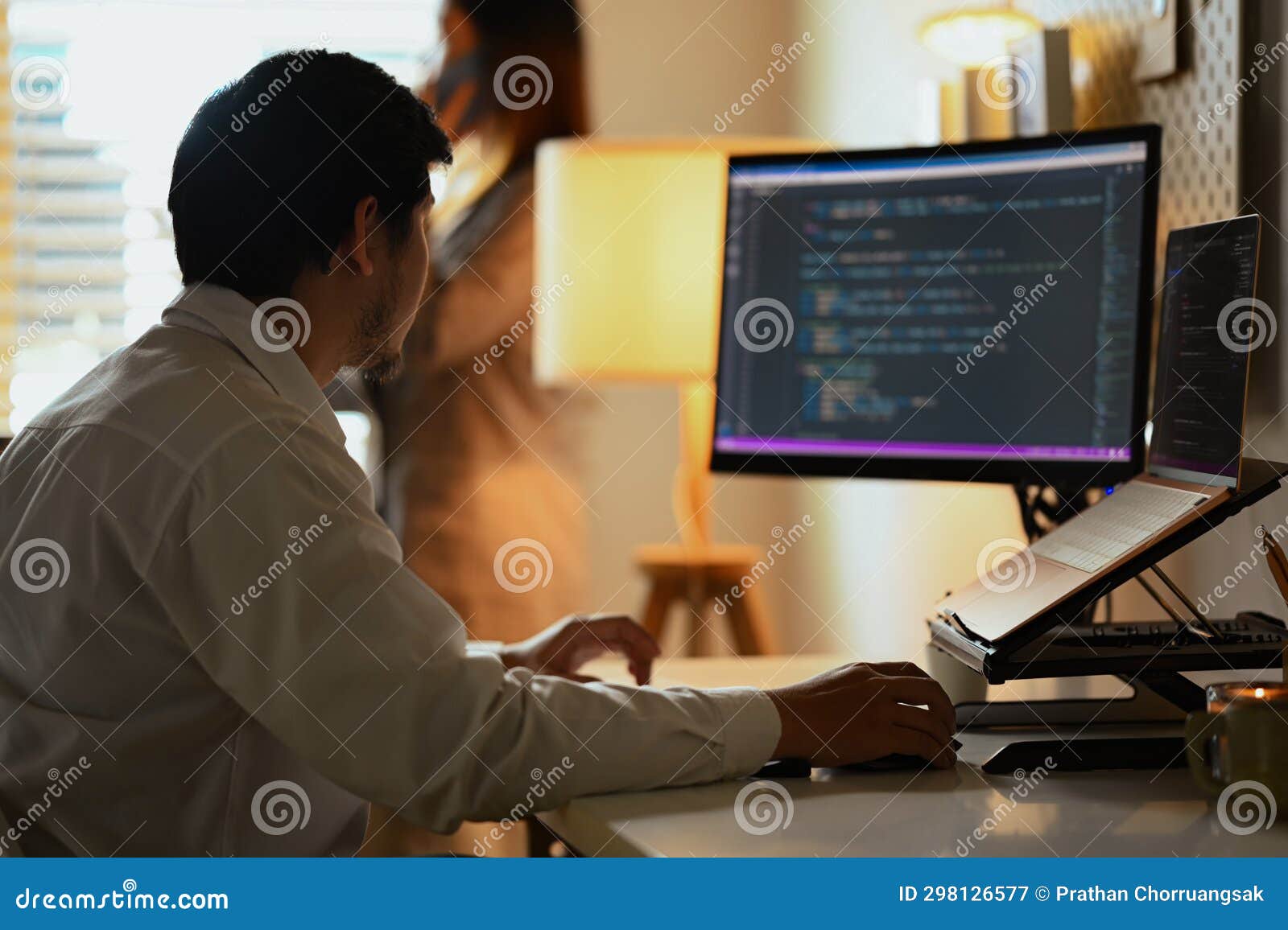 Focused Software Developers Man Programming on Desktop Computer in Dark ... Focused Software Developers Man Programming on Desktop Computer in Dark ...