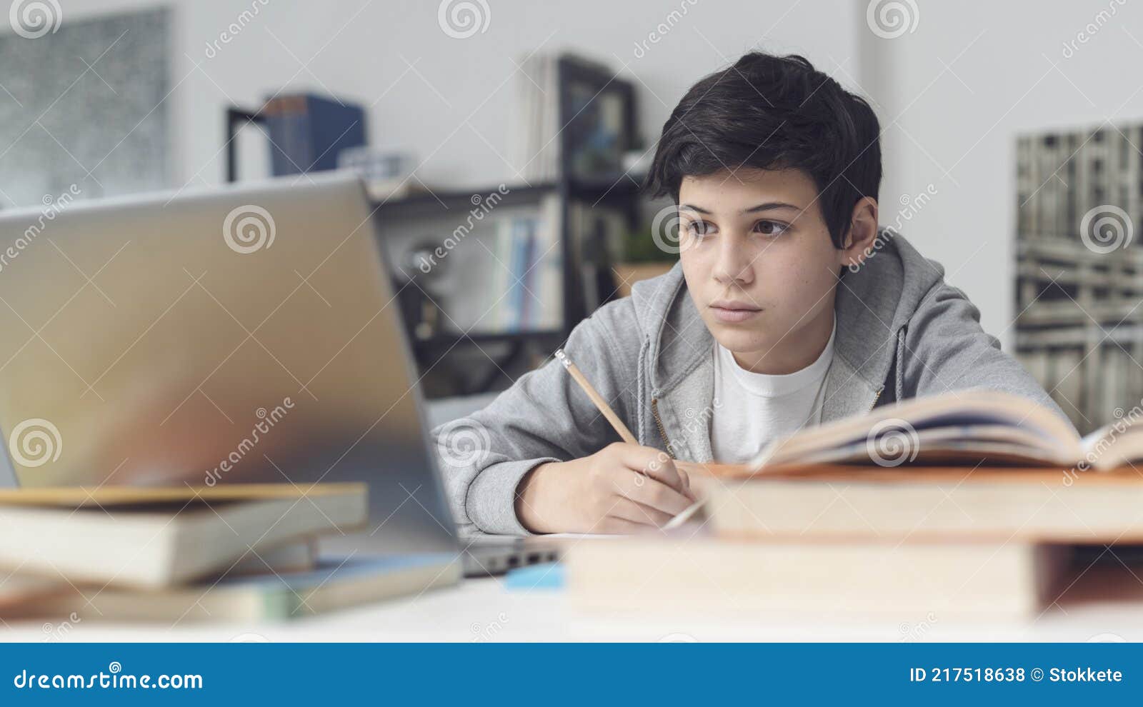 Focused Student Doing His Homework Stock Photo - Image of notes ...