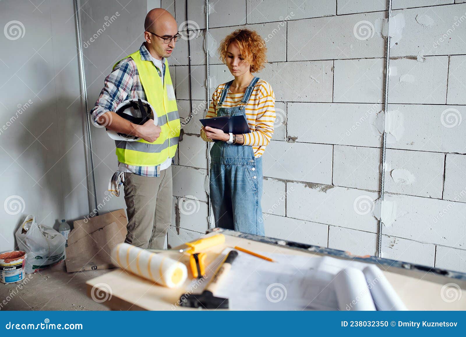 Focused on Task Engineering Team Going Over a Blueprint, Debating Stock ...