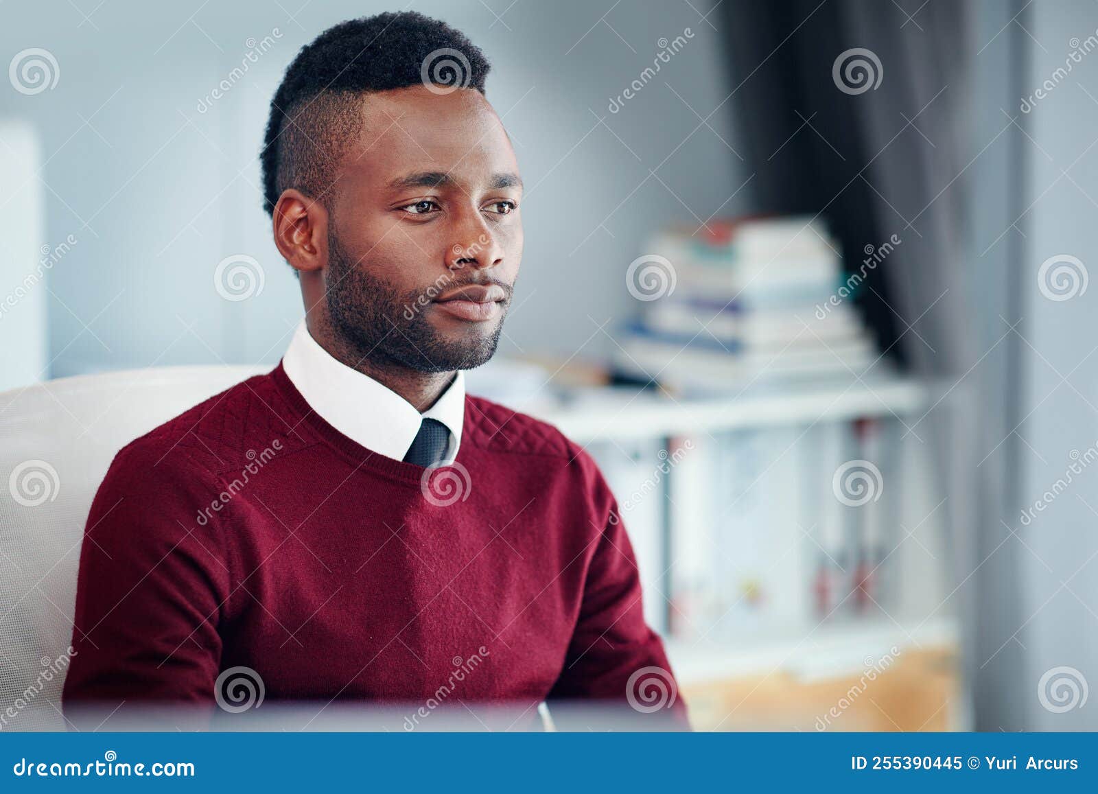 Focused on the Task at Hand. a Young Businessman Working at His Desk in ... Focused on the Task at Hand. a Young Businessman Working at His Desk in ...