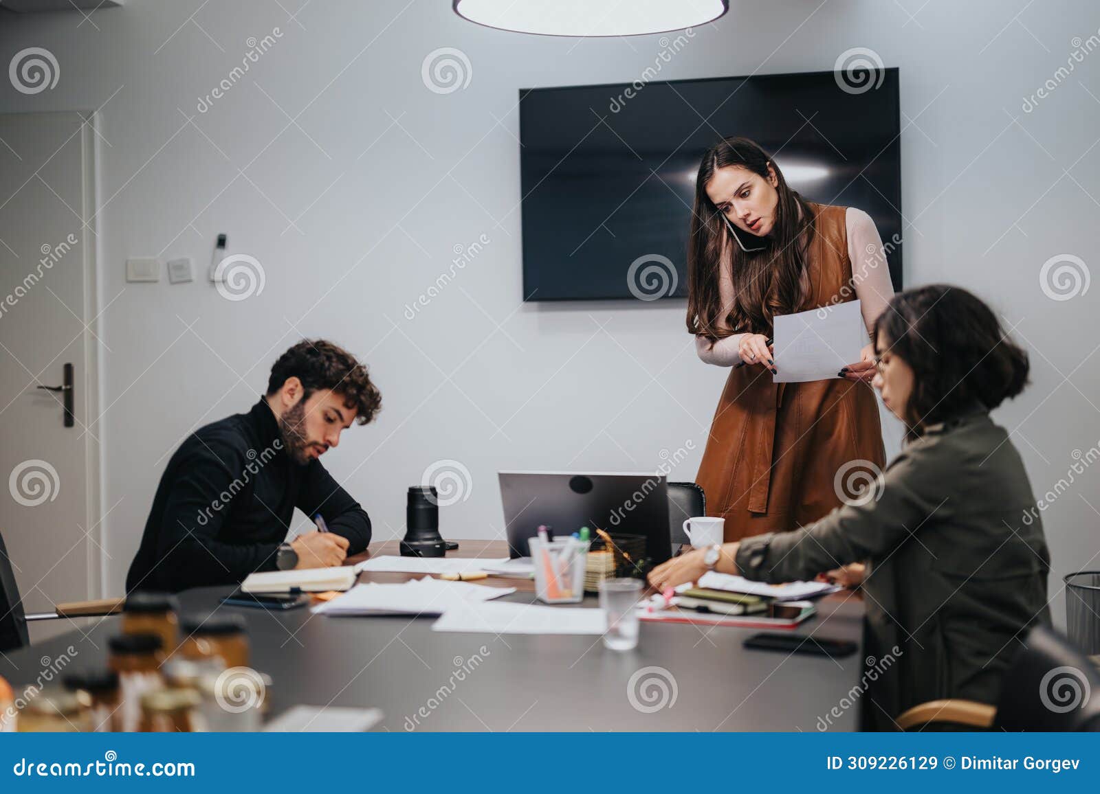 Focused Team Engaged in Problem Solving at Strategic Business Meeting ...