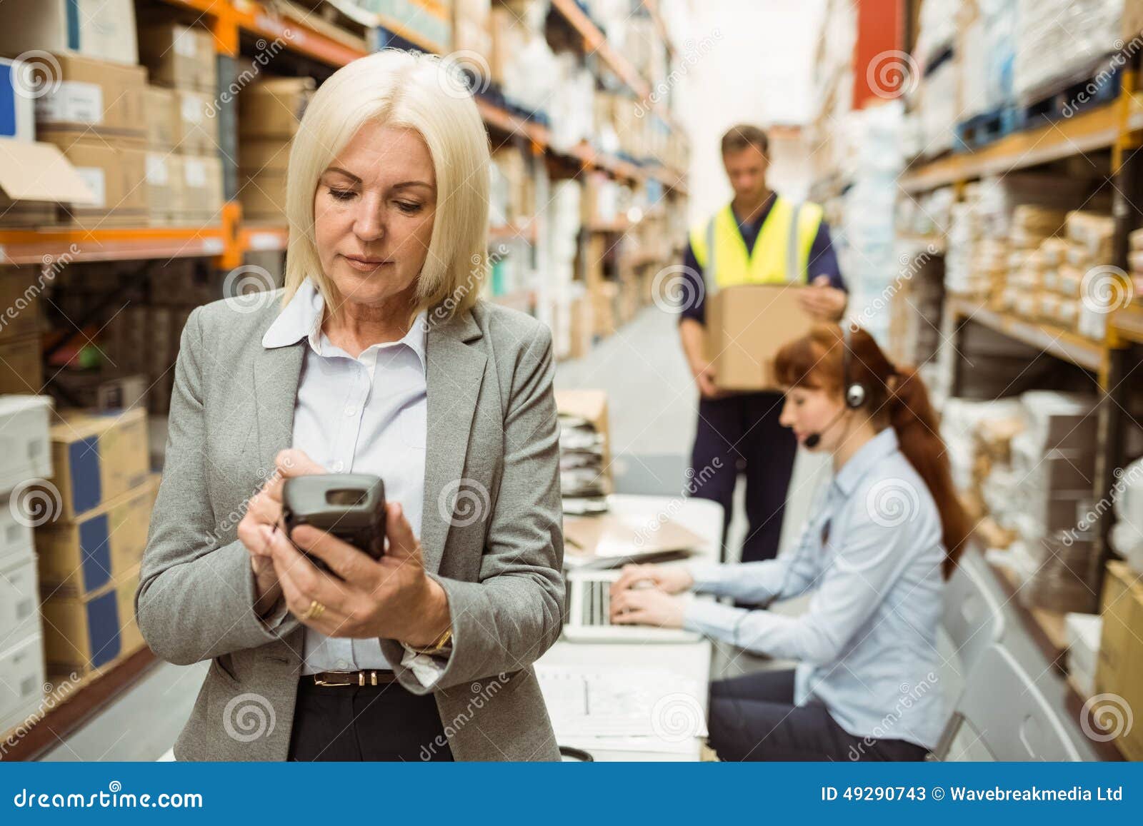 Focused Warehouse Manager Using Handheld Stock Image - Image of male ...
