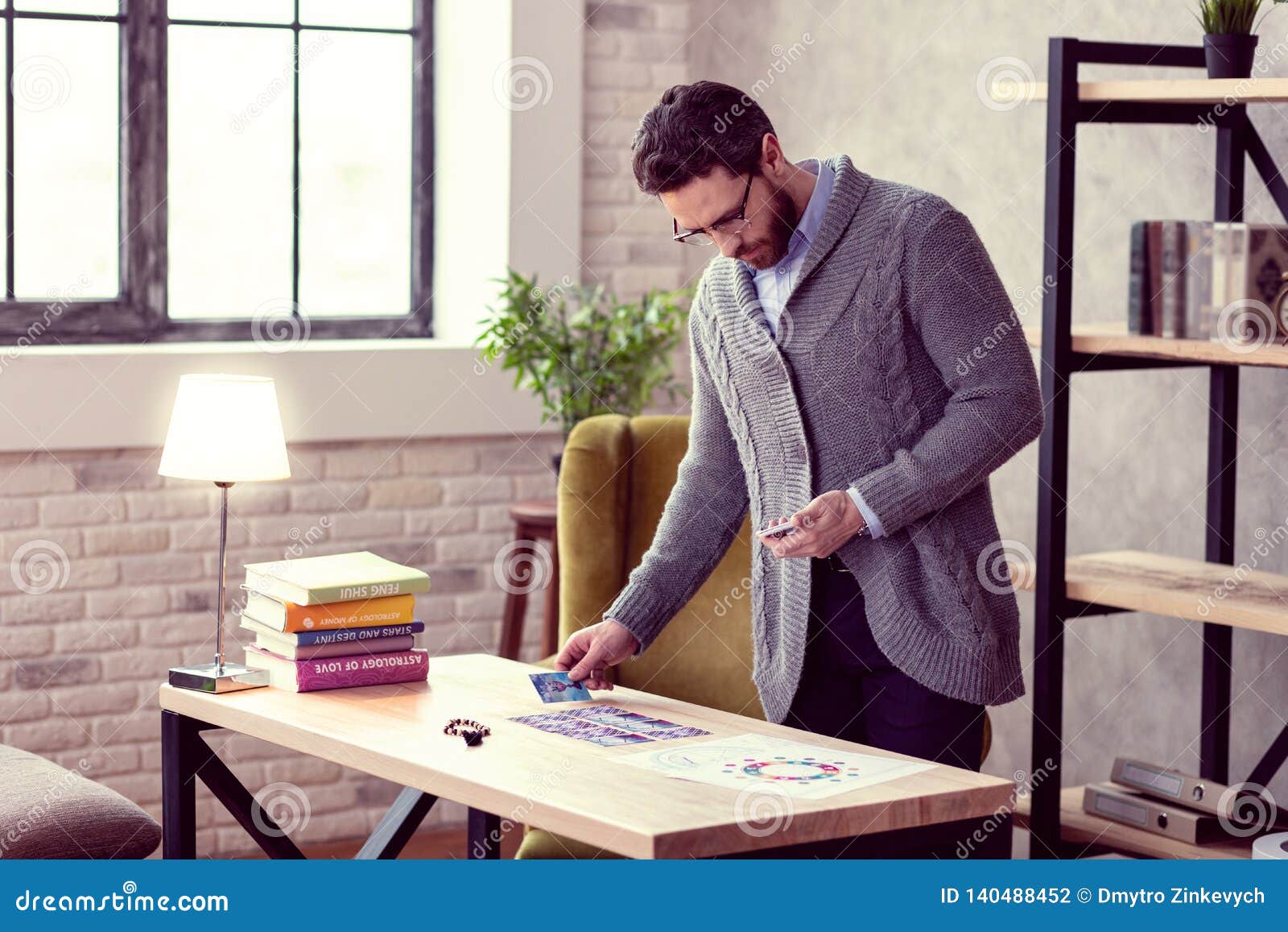 Nice Serious Man Standing at the Table Stock Photo - Image of bearded ...