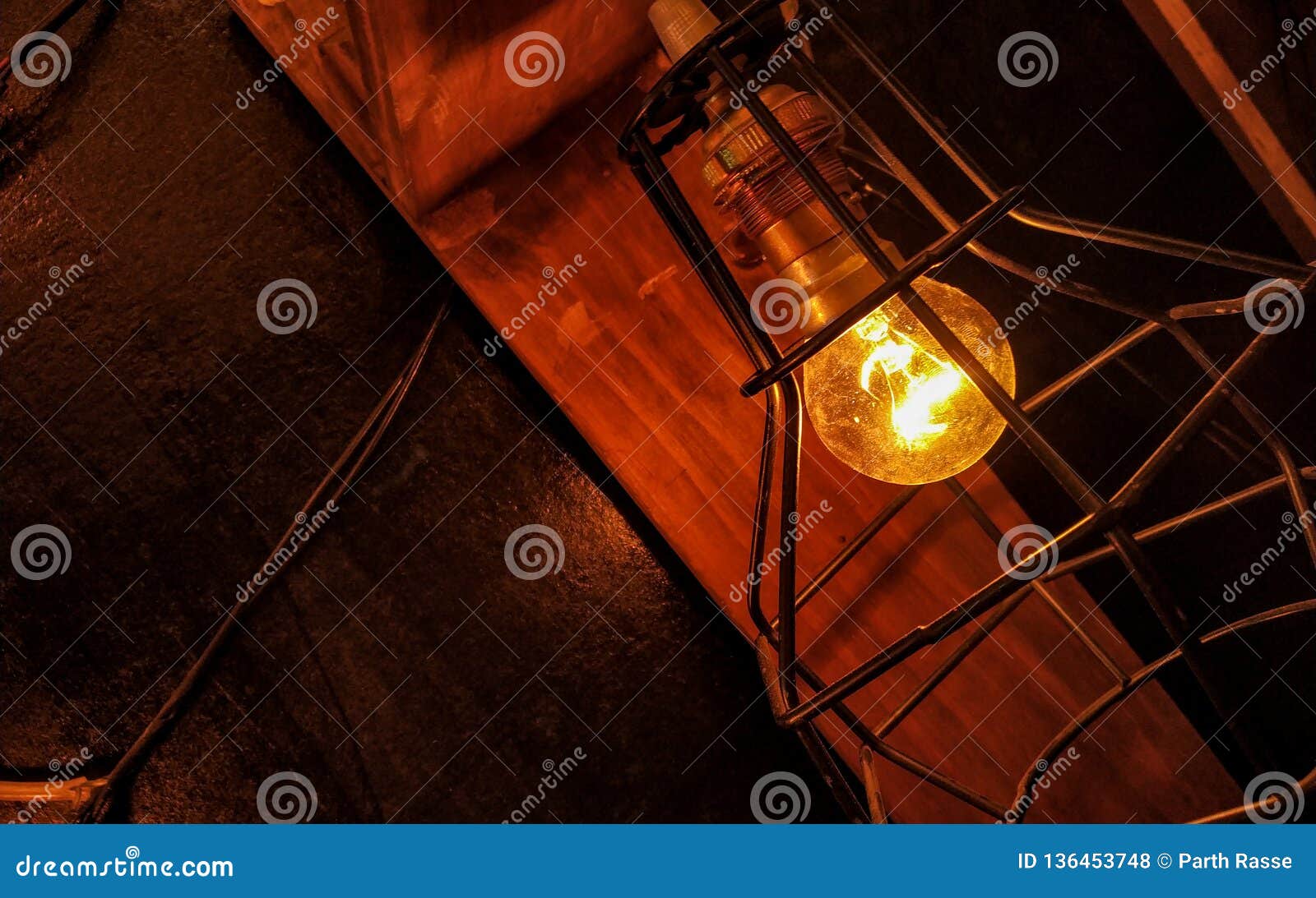 Focused Yellow Light Glass Bulb with Fixture and Gradient Light Stock ...