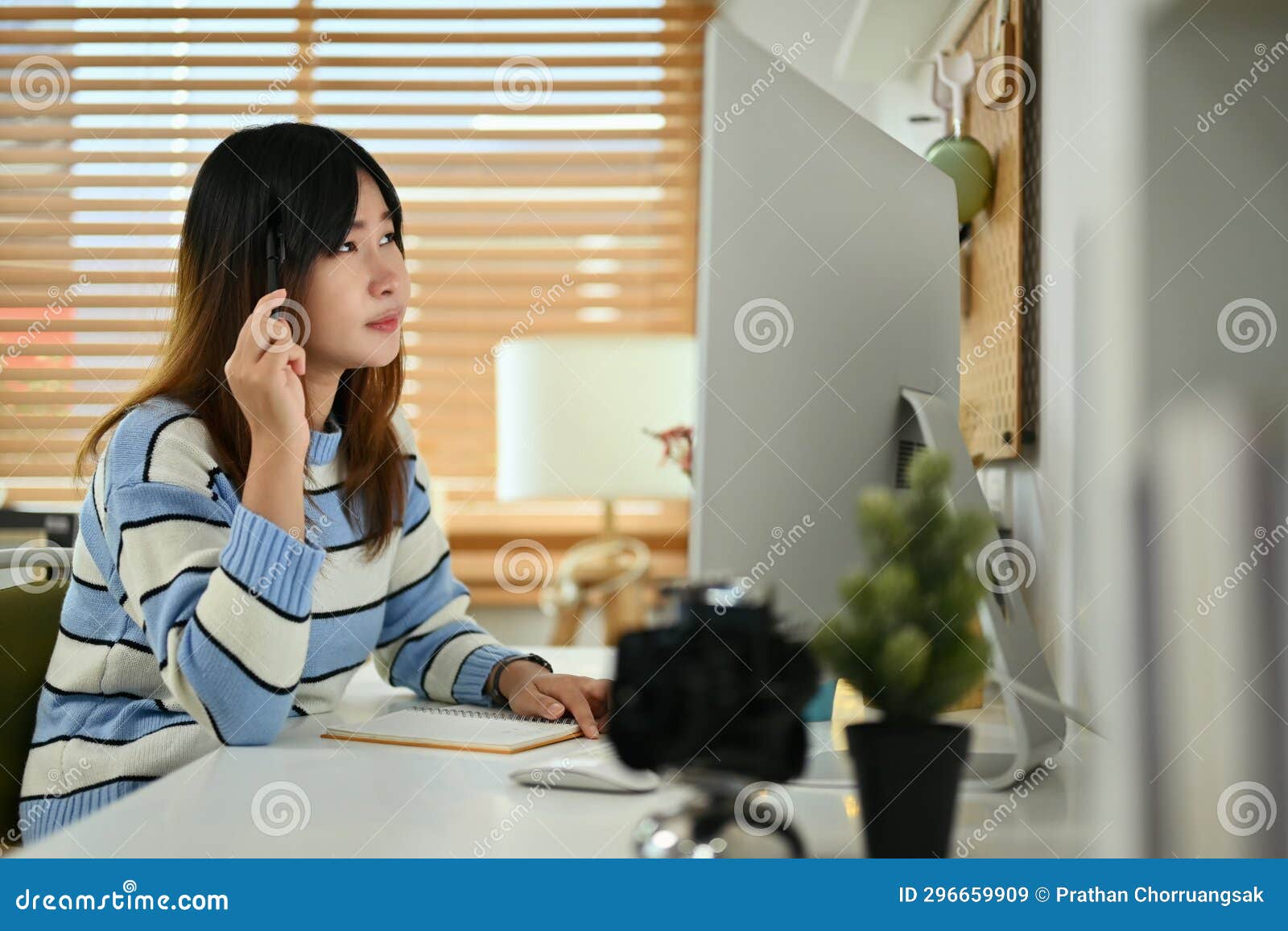 Focused Young Asian Woman Using Computer at Home Office Stock Image ...