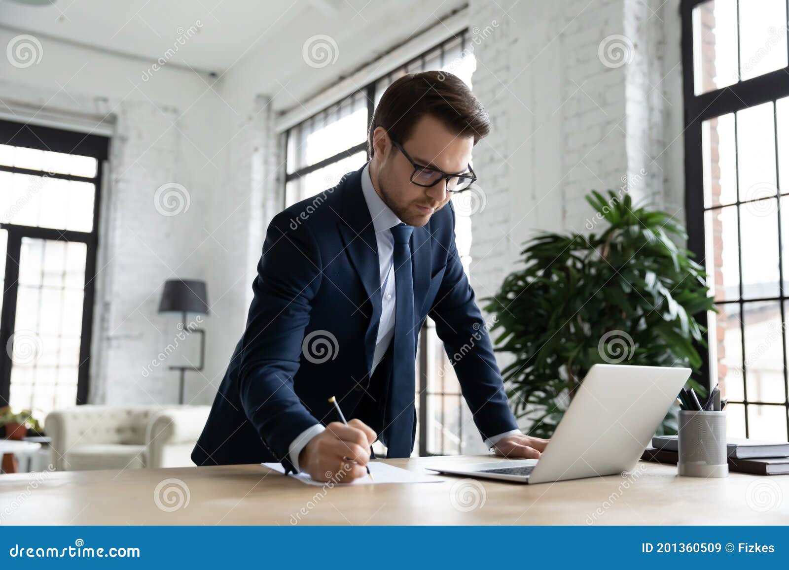 Focused Young Businessman Doing Online Research Analysis. Stock Image ...