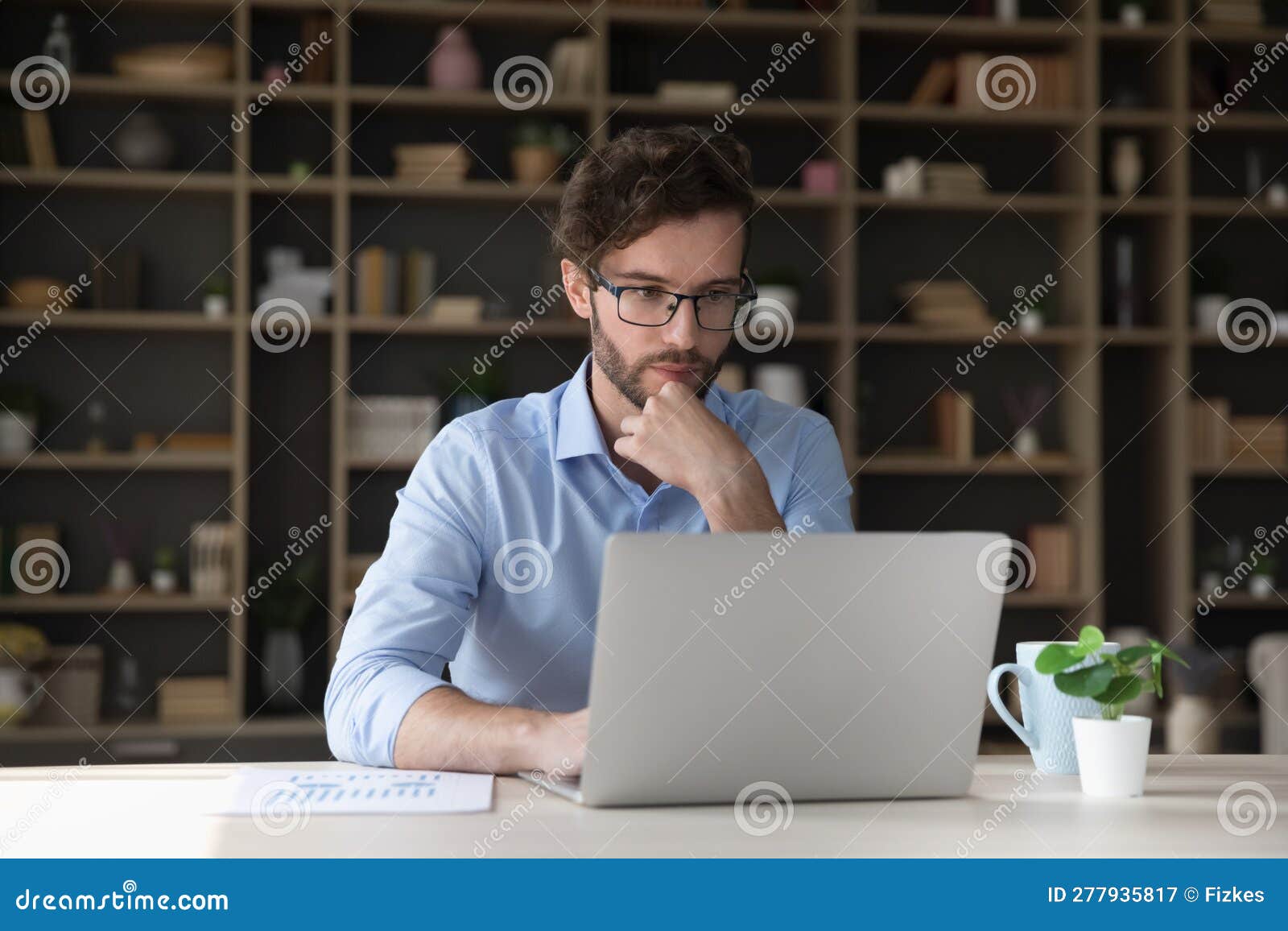 Focused Young Businessman Working at Laptop Computer Stock Image ...