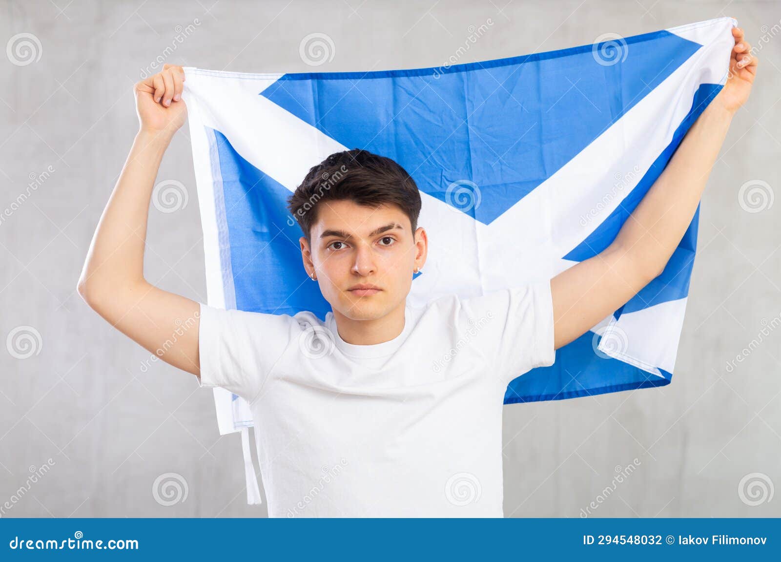 Focused Young Guy Holding Flag of Scotland Stock Photo - Image of ...