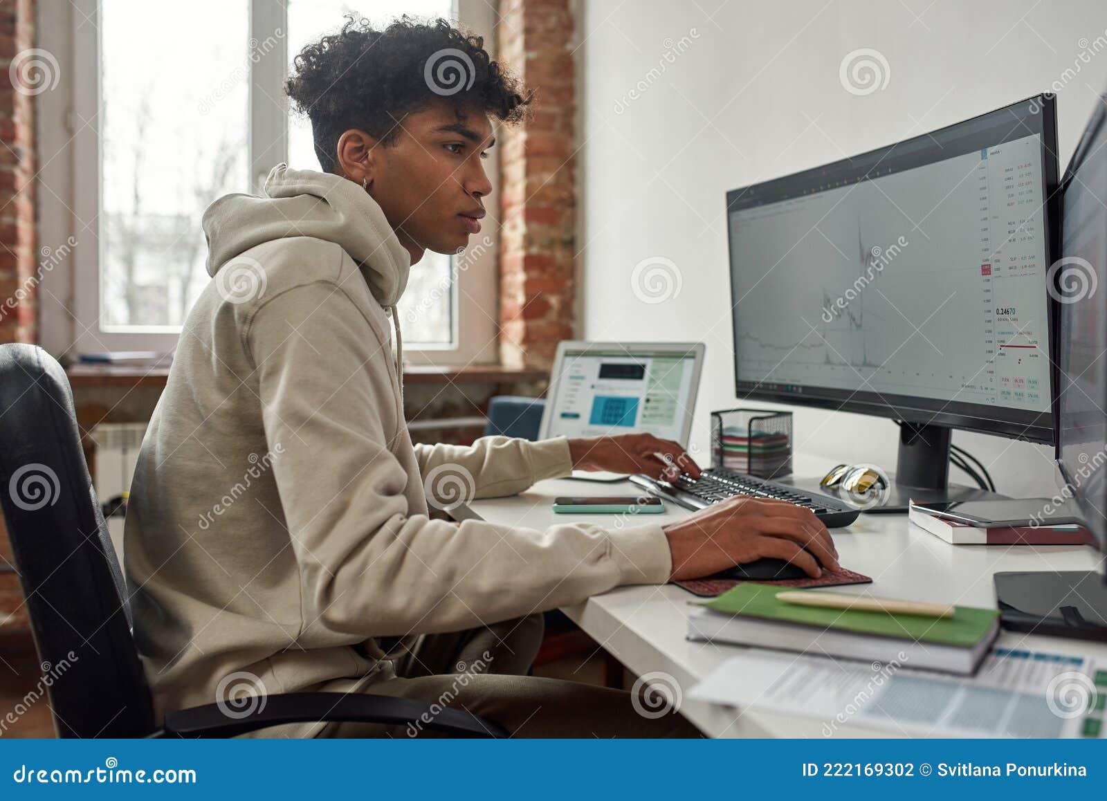 Focused Young Man Looking at Pc Screen while Trading Online Using ...