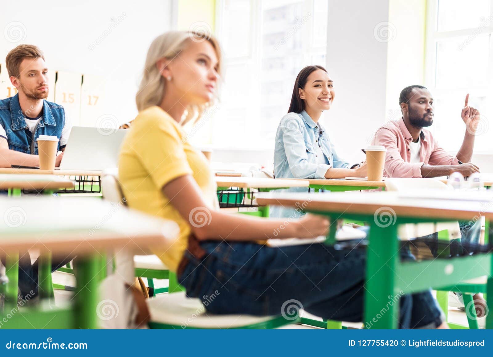 Focused Young Students Sitting in Classroom Stock Photo - Image of ...