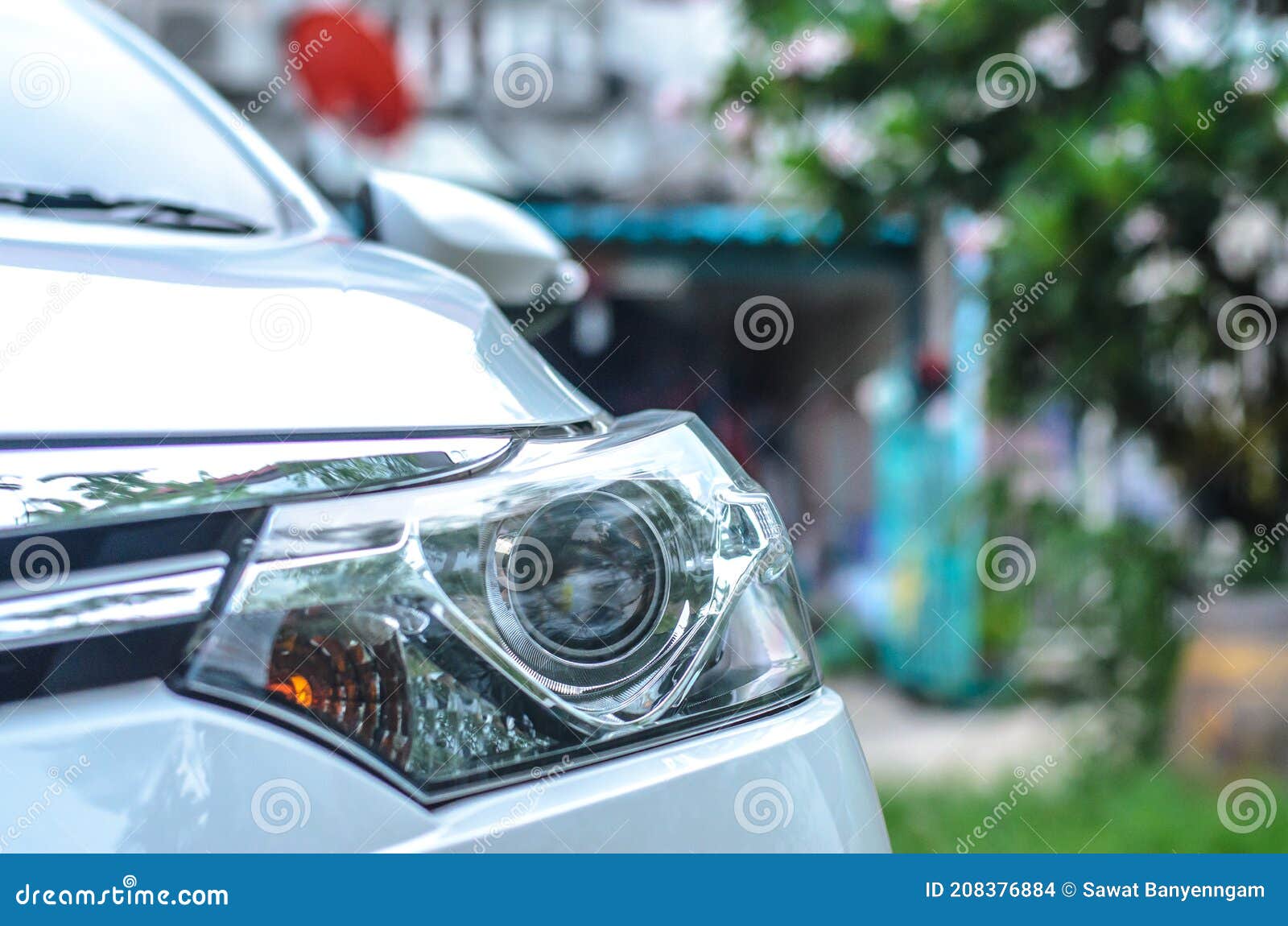 Focusing on the Headlights of White Car. Stock Photo - Image of ...