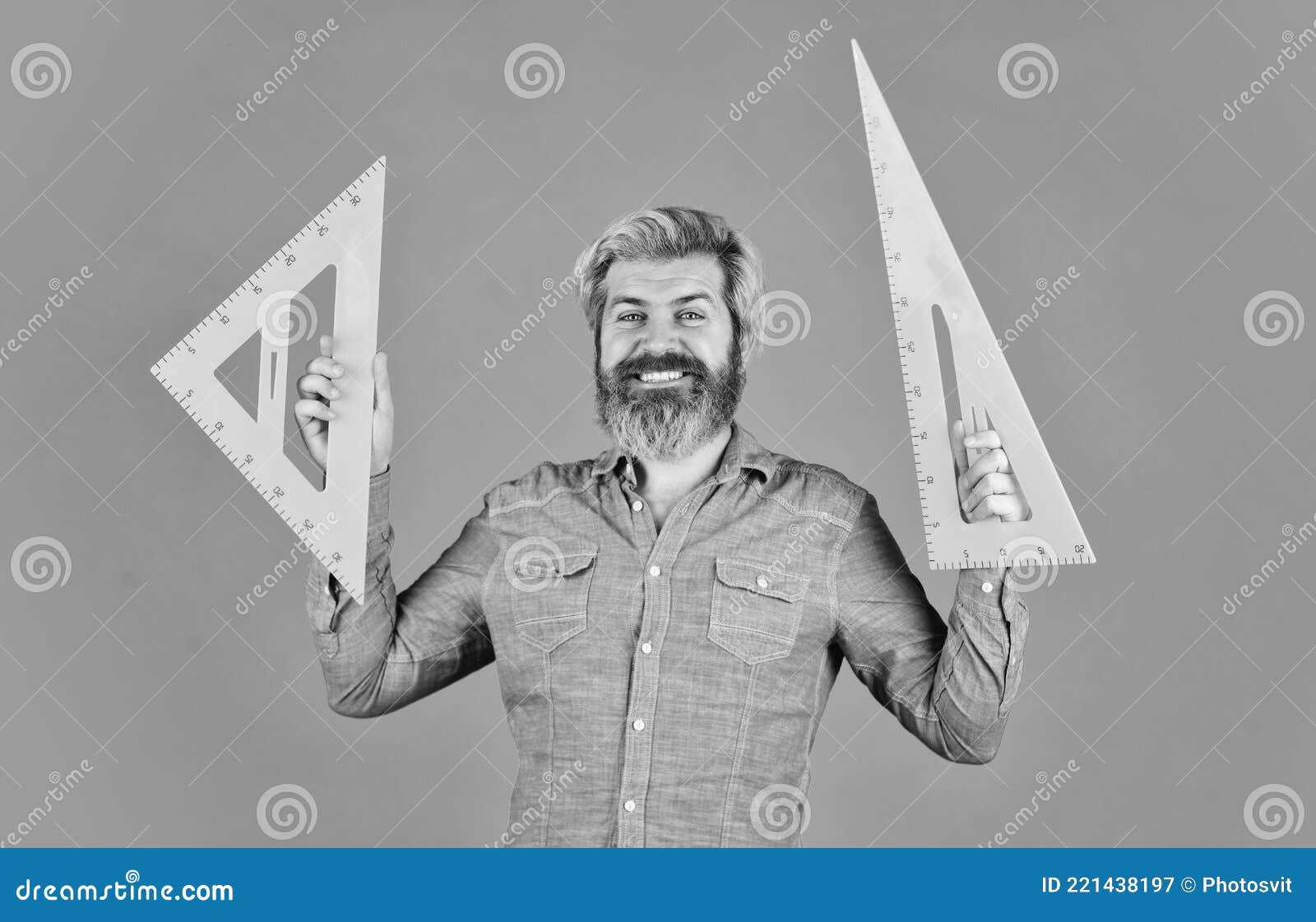 Focusing on Work. Education. School Teacher Use Triangle. Math and ...