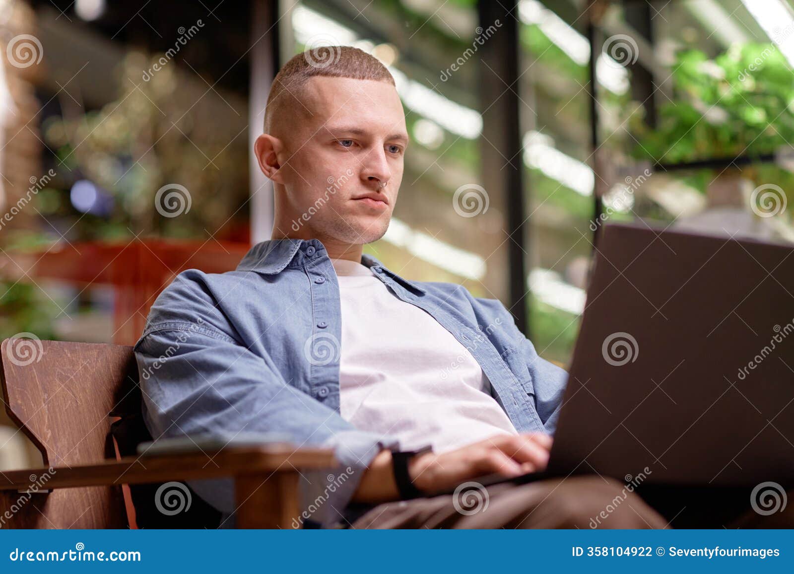 Focusing on Work in Modern Office Environment Stock Photo - Image of ...