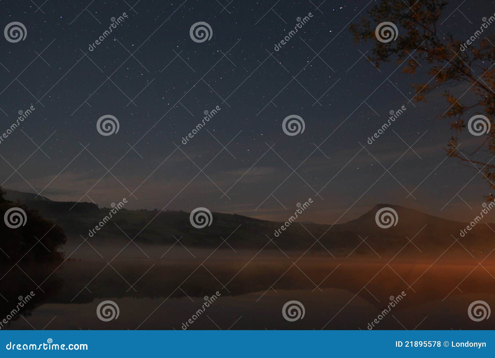 Foggy lake at night stock photo. Image of mountains, stars - 21895578