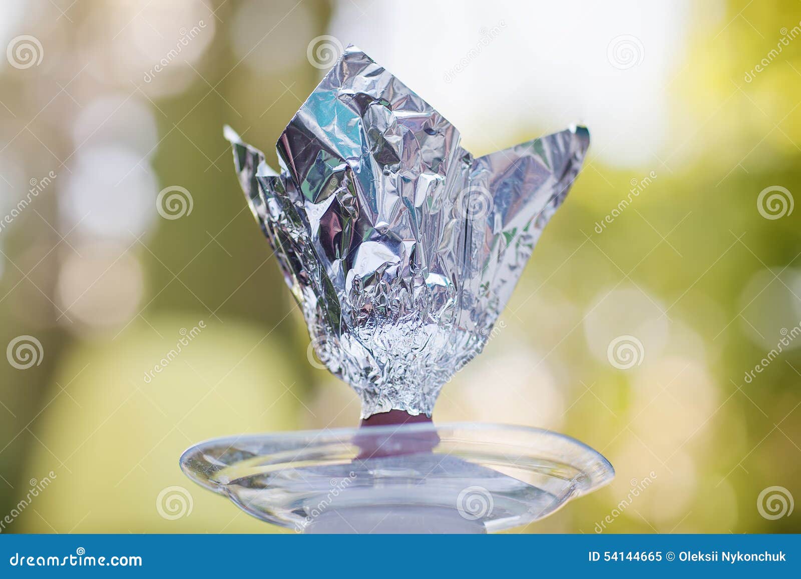 A Glass Hookah Flask Filled With Bubbling Water And Smoke Glows In The ...