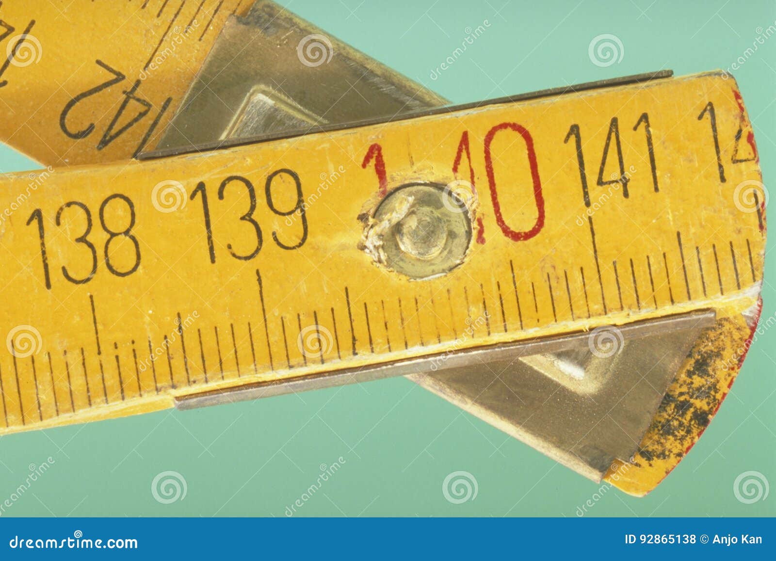 Foldable yellow ruler stock photo. Image of instrument - 92865138