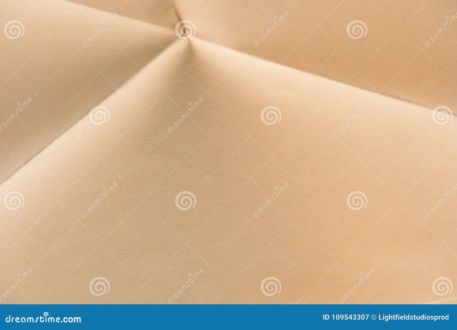 Folded biege color paper stock image. Image of fold - 109543307