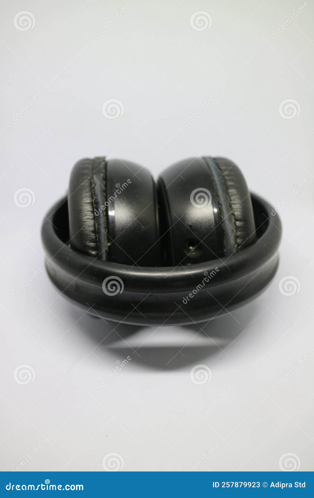 Folded Black Bluetooth Headphones on a White Background Stock Image ...