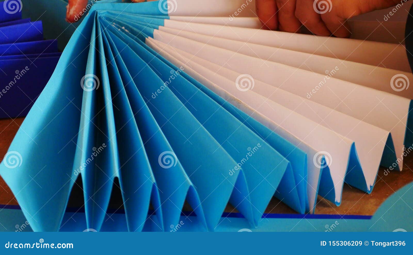 Folded Blue and White Paper Stock Image - Image of crafting, bends ...