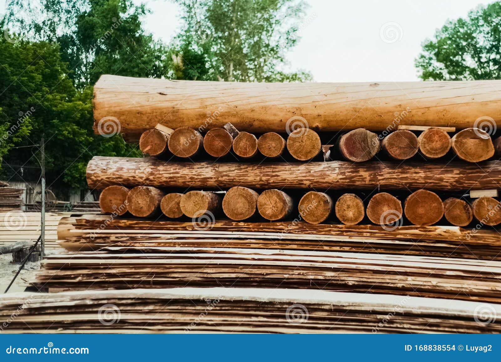 Folded Boards and Logs on Construction Site Stock Photo - Image of ...
