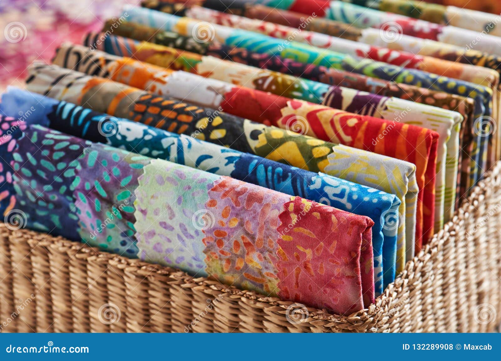 Folded Bright Pieces of Quilting Batik Fabrics in a Basket, Macr Stock ...