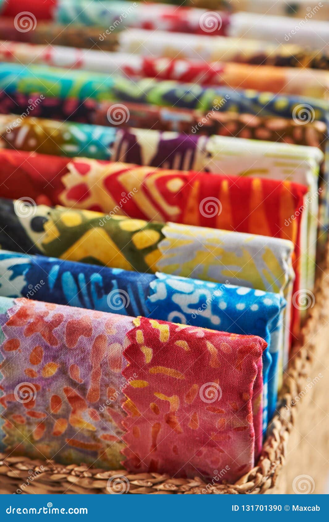 Folded Bright Pieces of Quilting Batik Fabrics in a Basket, Macro Stock ...