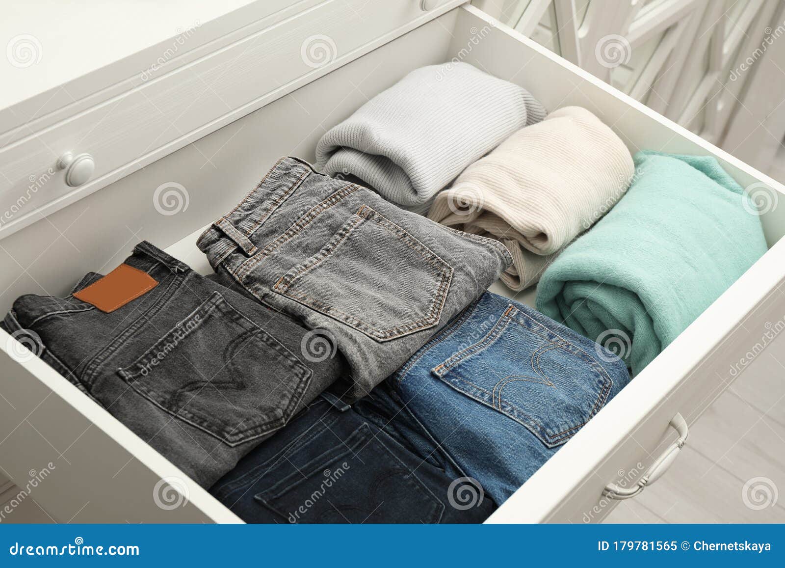 Folded Clothes in Drawer. Apparel Storage Stock Image - Image of ...