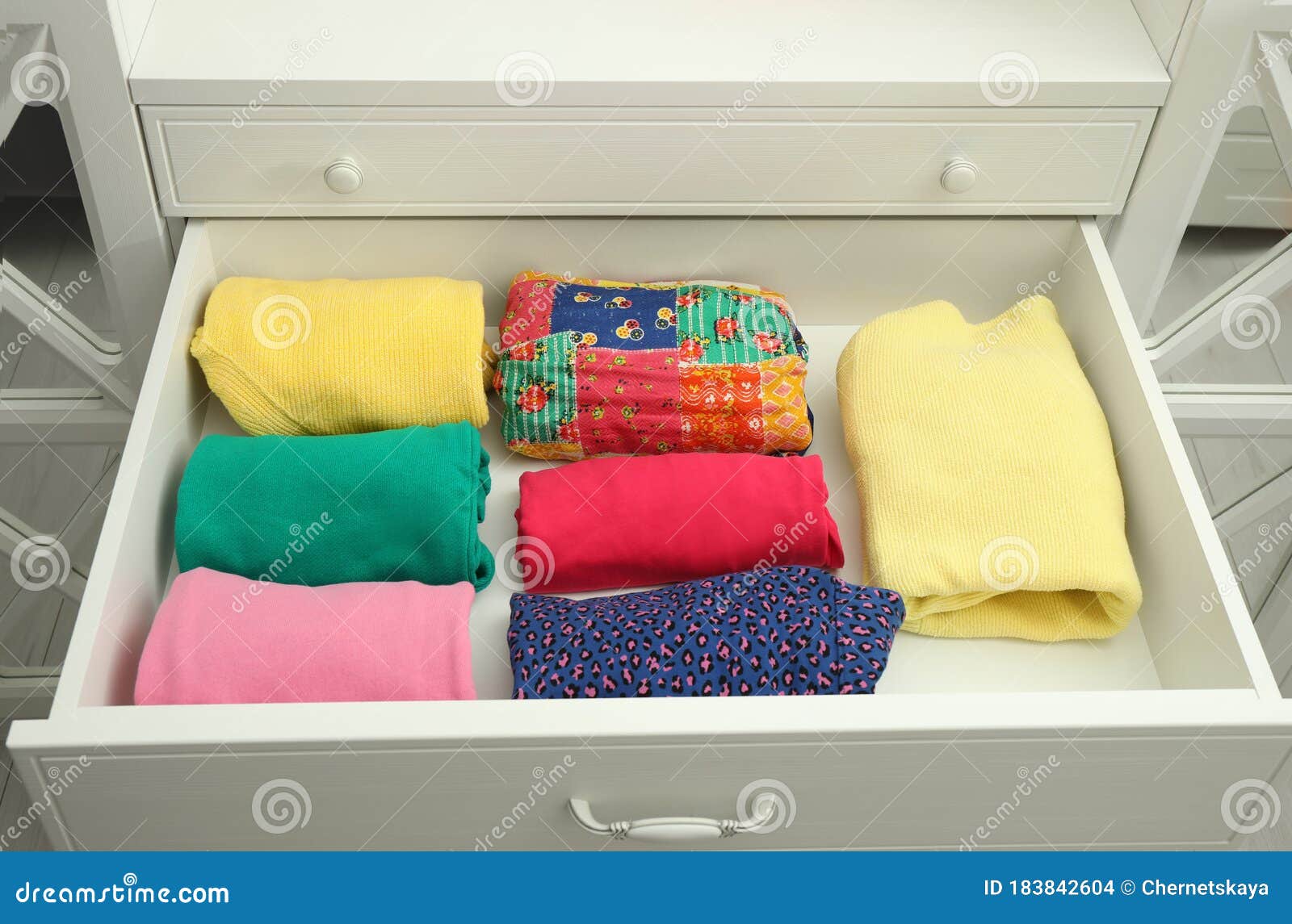 Folded Clothes in Drawer. Apparel Storage Stock Photo - Image of ...