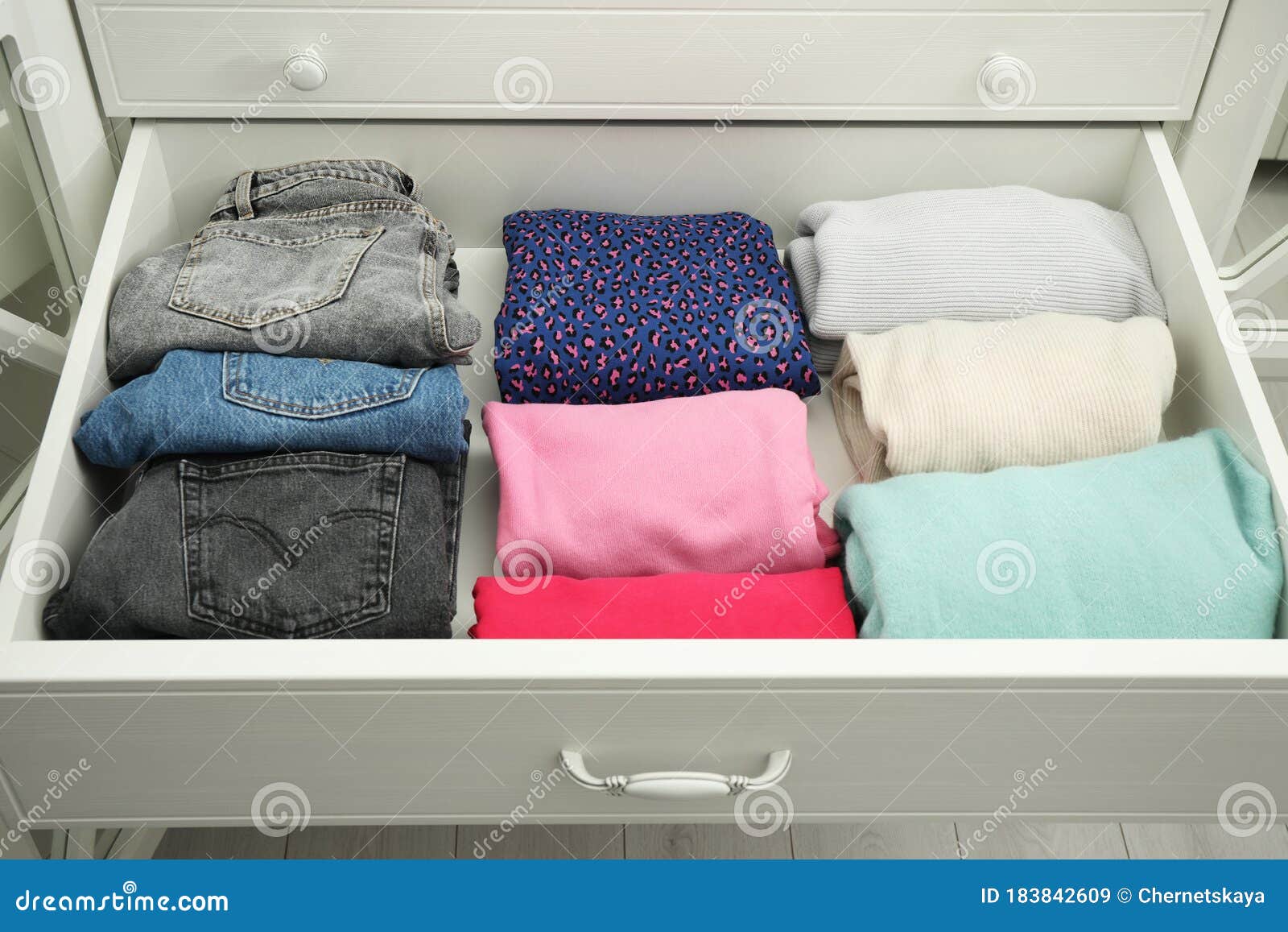 Folded Clothes in Drawer. Apparel Storage Stock Image - Image of casual ...