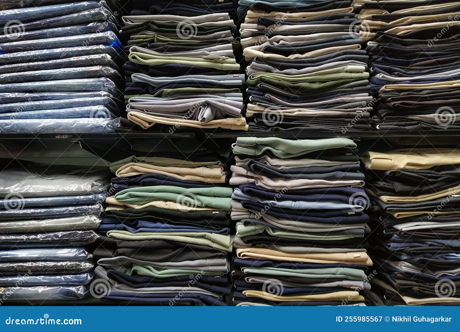 Folded Clothes in Rack in Cloth Store Stock Image - Image of showcase ...