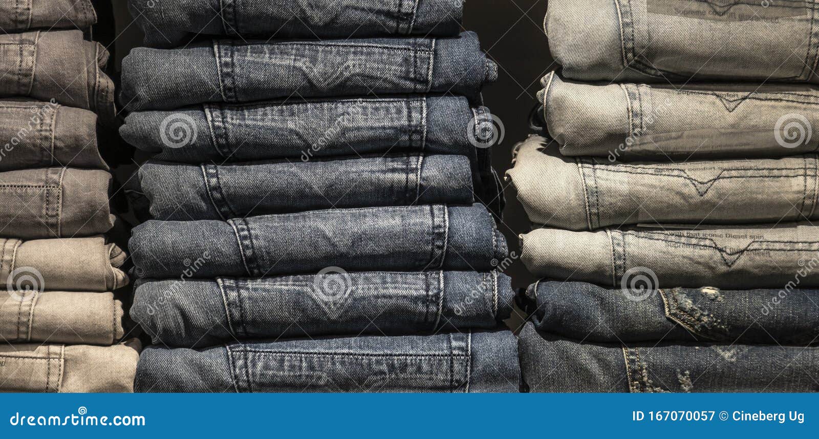 Folded denim jeans stock image. Image of closet, pants - 167070057