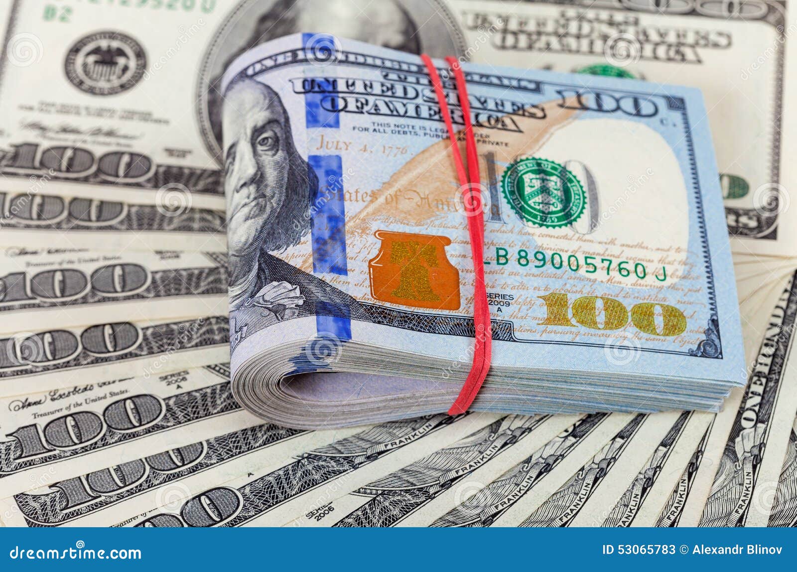 Folded Dollar Bills Wrapped by Rubber Lying Over Banknotes Stock Image ...