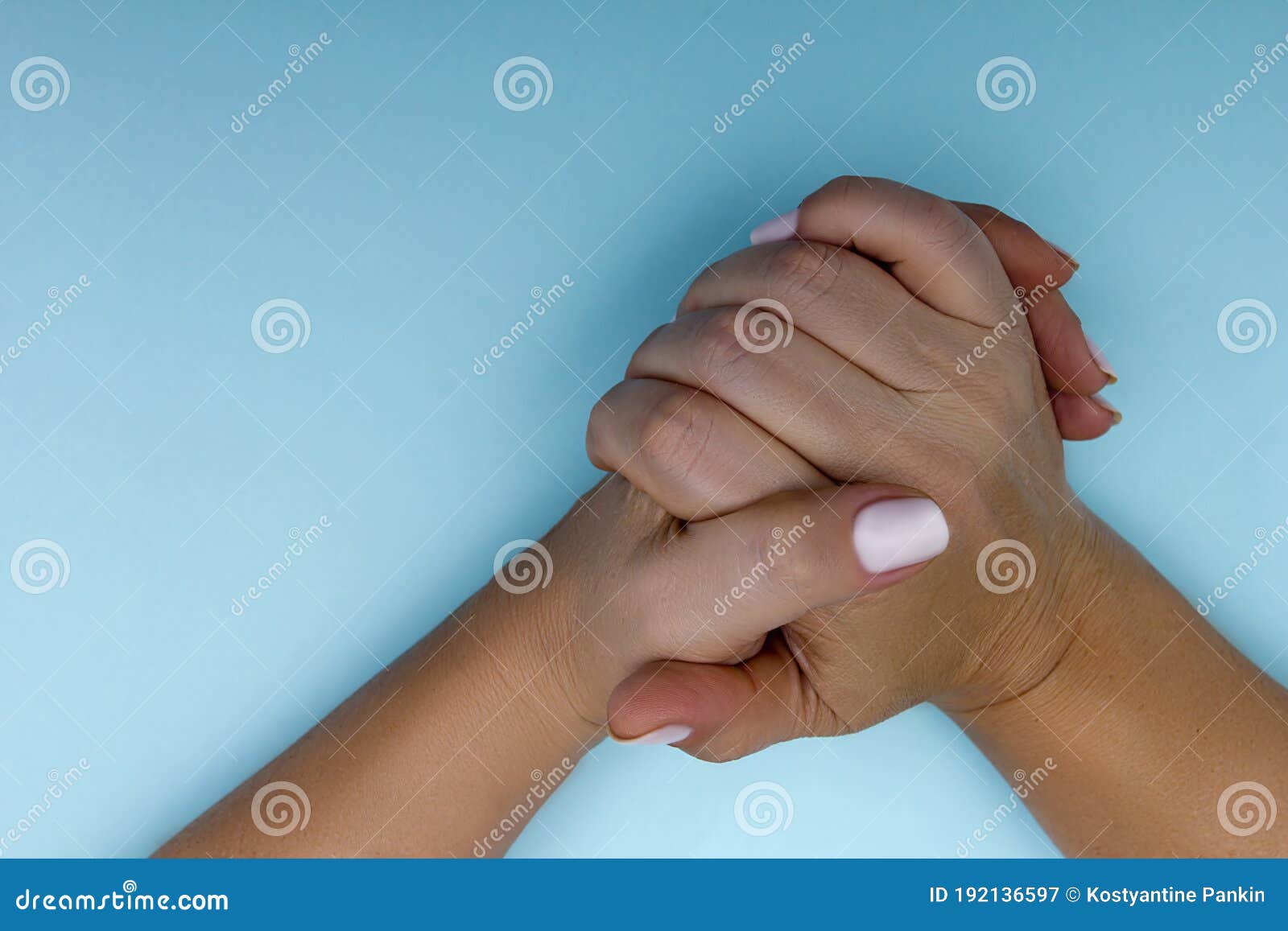 Folded female hands stock image. Image of sign, woman - 192136597