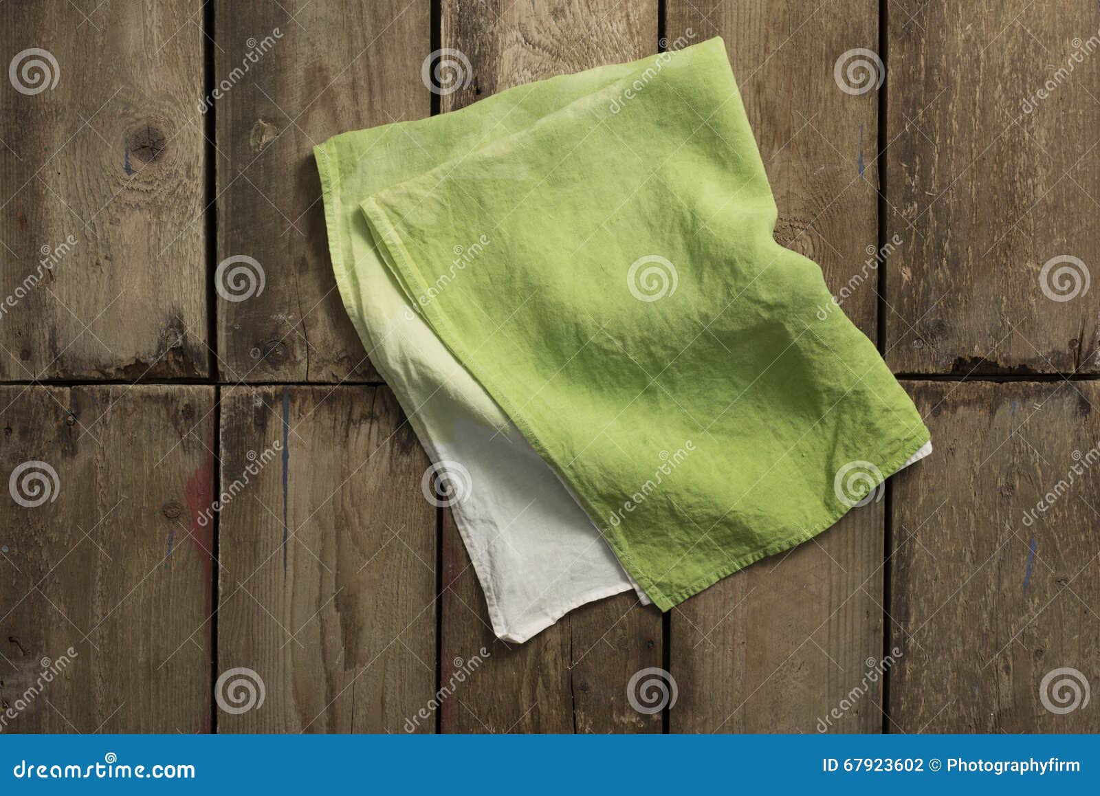 Folded Green Cloth or Linen on Wooden Panel Surface Stock Photo - Image ...